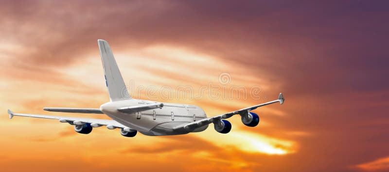 Commercial Airplane Flying Above Clouds in Dramatic Sunset Light. Very ...