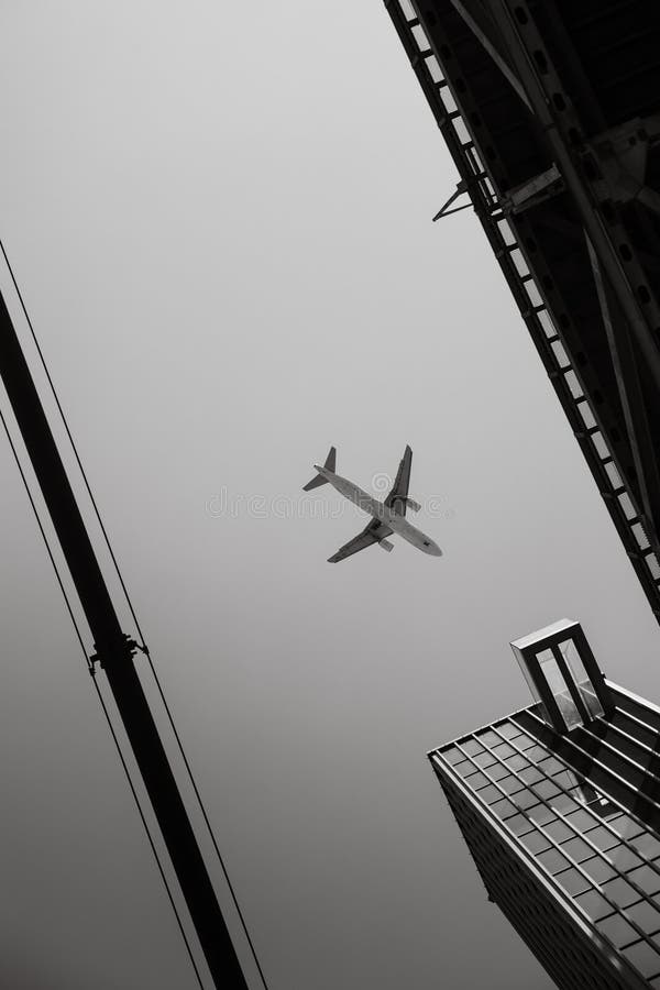 Commercial Airplane Flying Overhead, Viewed from the Ground between ...