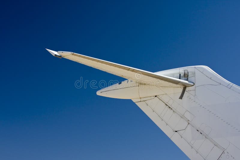 Commercial airplane tail stock image. Image of profile - 10846681