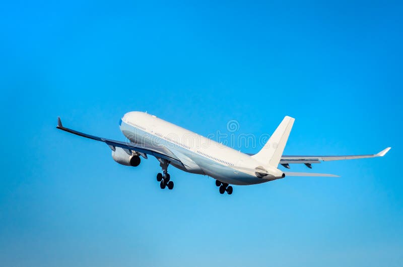 Commercial Airplane Taking Off into the Blue Sky Stock Image - Image of ...