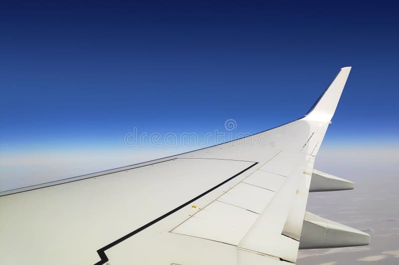 Commercial Airplane Wing in Flight Stock Photo - Image of aircraft ...