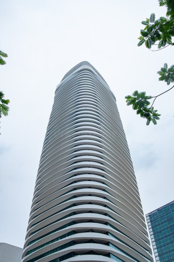 Commercial Building in a Cloudy Day Vertical Composition Stock Photo ...