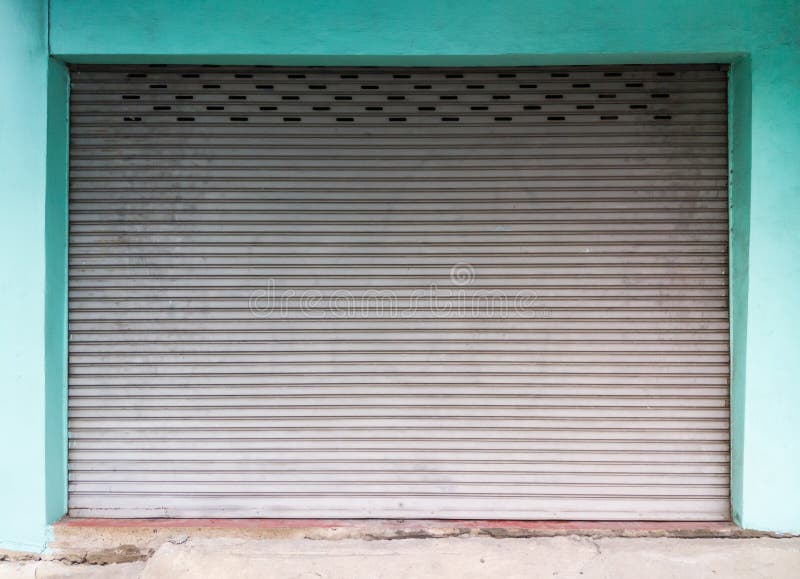 Commercial Buildings with the Shutter Door Stock Image - Image of close ...