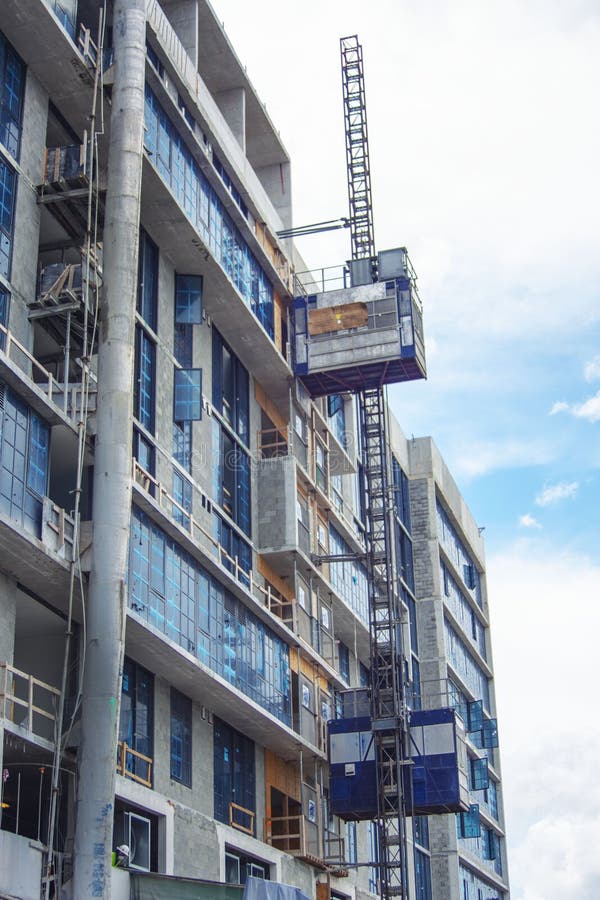Commercial Construction Site with Elevator Editorial Photo - Image of ...