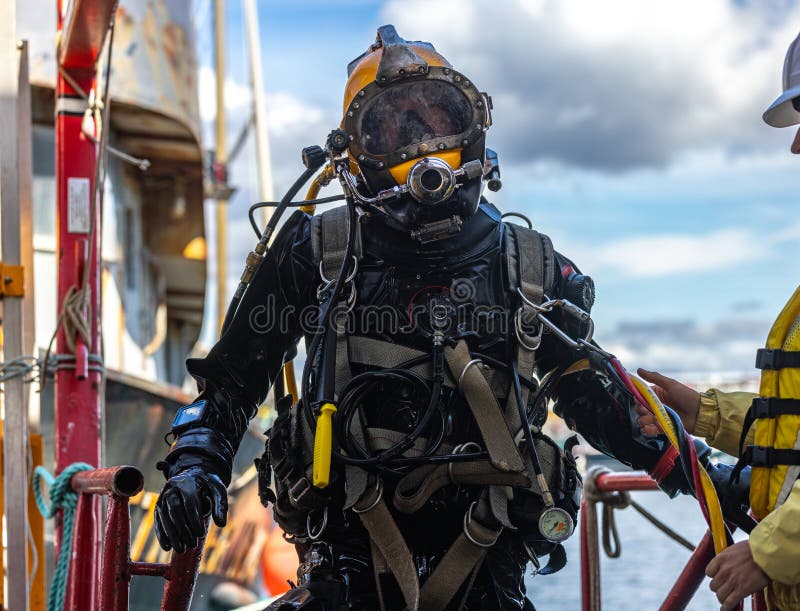 Commercial Diver Moving Out from Water after Work Stock Image - Image ...