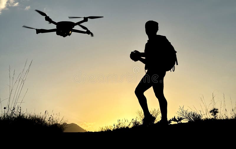 Commercial Drone Pilot and User Stock Photo - Image of silhouette ...