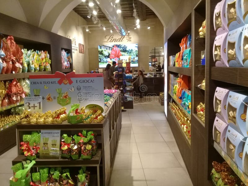 A Commercial Establishment with Shelves in the Middle with Various ...