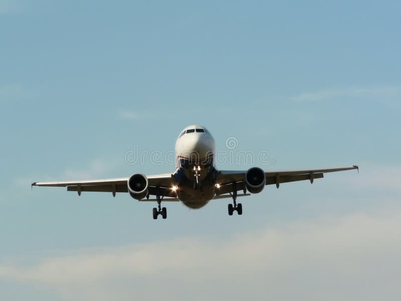 Jet Plane in Flight - Landing Side View 2 Stock Image - Image of ...