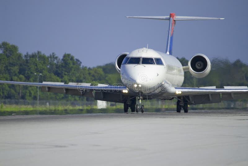 Commercial jet taking off stock image. Image of tower, thrust - 810947