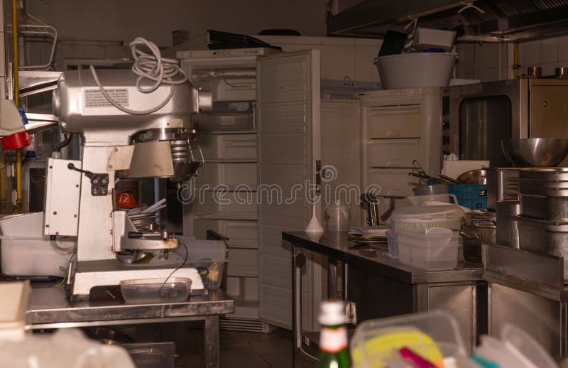 Commercial Kitchen Interior with Industrial Mixer and Open Refrigerator ...