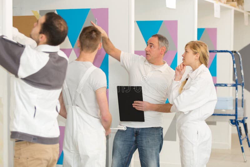 Commercial Painting Apprentice Studying Wall Design Stock Photo - Image ...