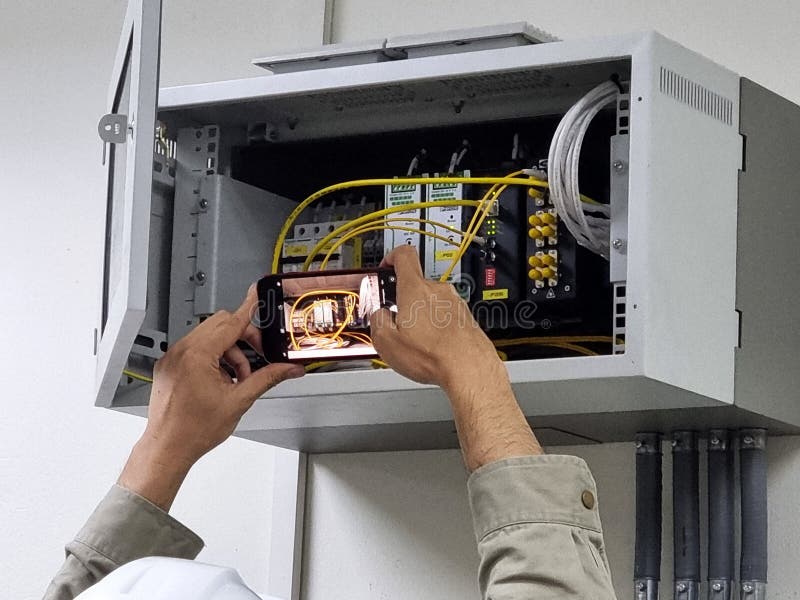 The Commissioning Engineer Takes a Photo of the Interface Module in the ...