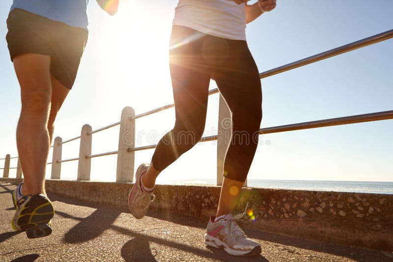 Commit To Be Fit. Two People Jogging on the Promenade. Stock Photo ...
