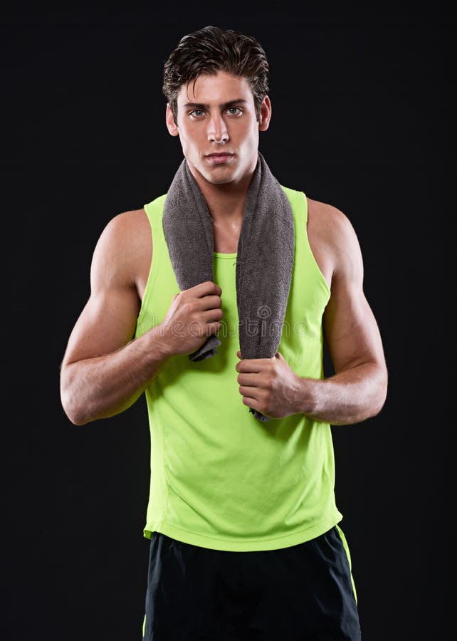 Commit To Being Fit. Studio Shot of a Handsome Young Man in Sportswear ...