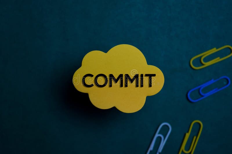 Commit Write on a Sticky Note Isolated on Office Desk Stock Photo ...