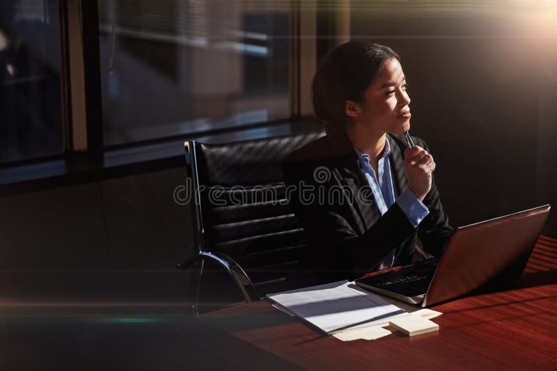 Without Commitment, You Cannot Have Depth in Anything. a Young Woman Contemplating while Using ...