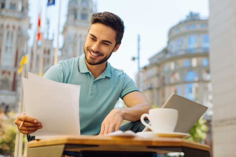 Committed Handsome Man Reading the Documents Carefully Stock Image ...