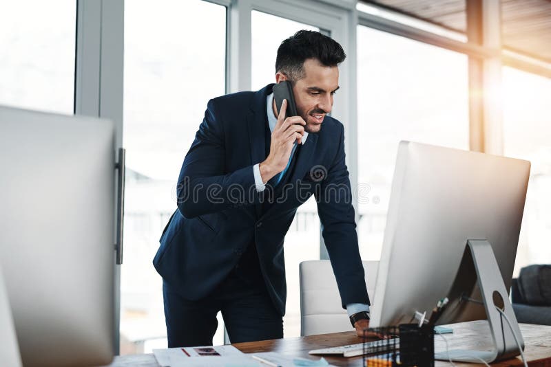 Committed To Getting the Job Done. a Handsome Male Executive Working in ...