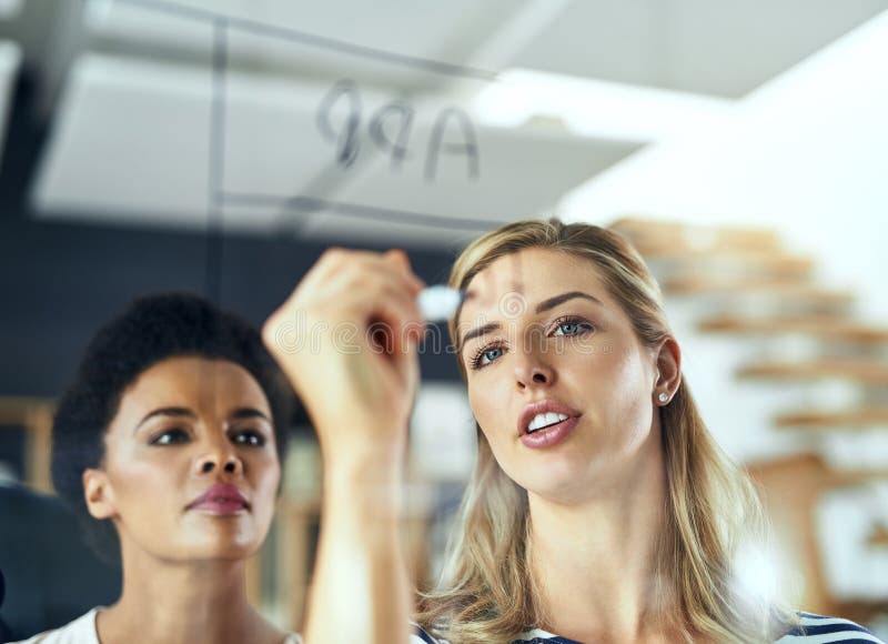 Committed To See the Plan through from Start To Finish. Two Colleagues ...