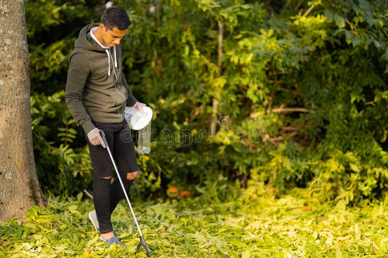 Committed Volunteer Conserving Environment from Pollution and Plastic ...