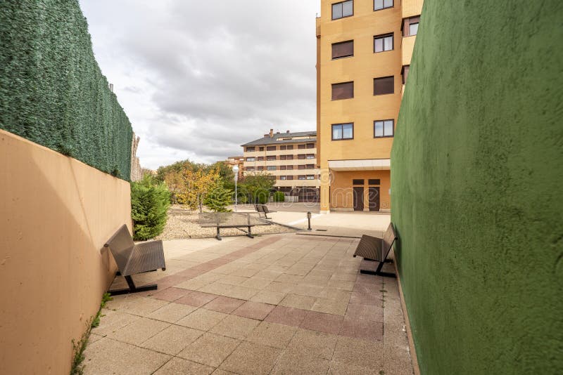 Common Areas of an Urban Housing Development with Metal Benches Stock ...