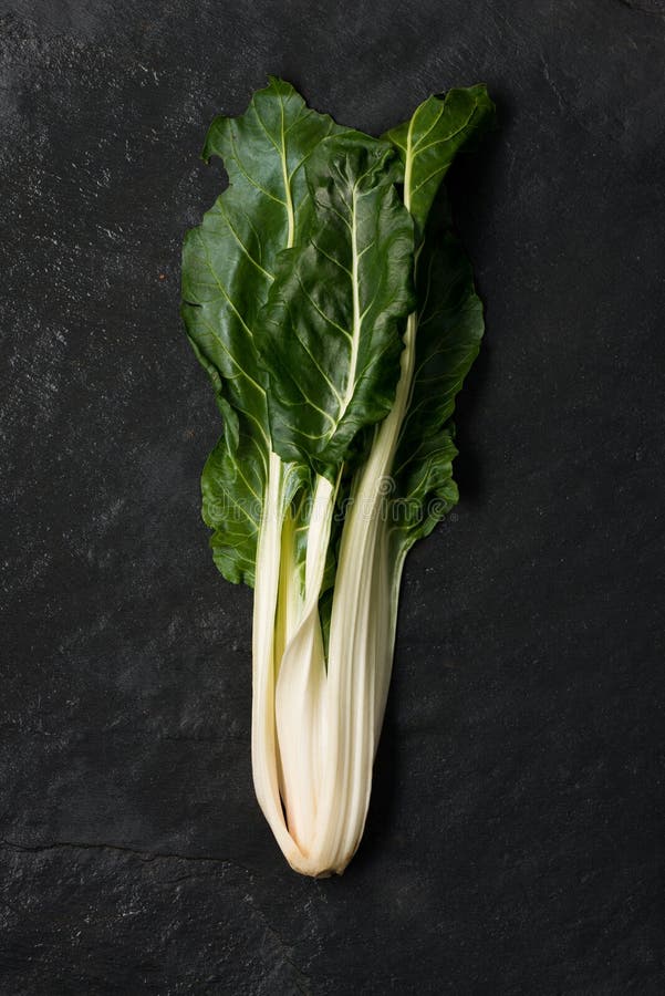 Common Chard on Dark Grey Stone Surface Flat Lay Stock Photo - Image of ...