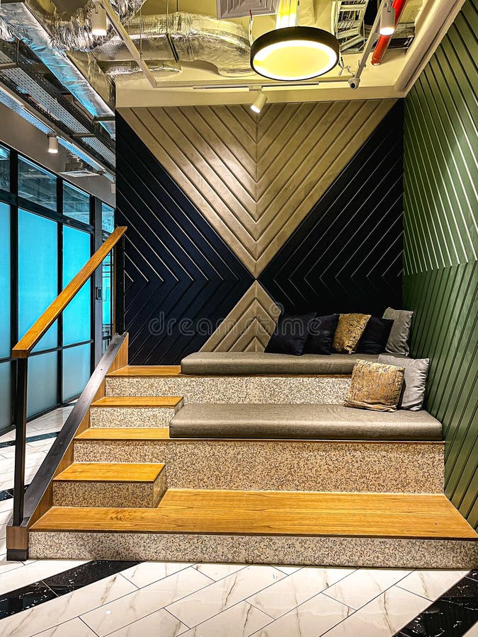 A Common Space Area with a Diagonal Patterned Wall Stock Image - Image ...