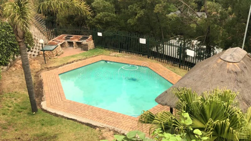 Communal Swimming Pool in Greenery on a Cloudy Day Stock Video - Video ...