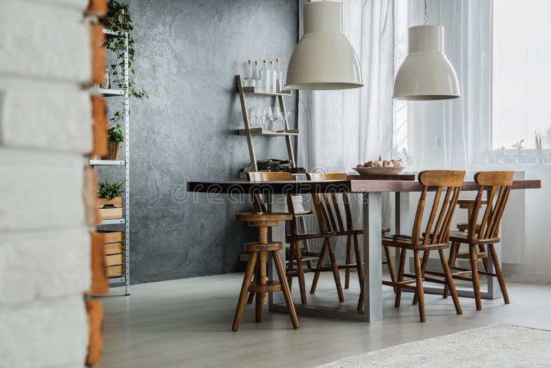 Communal Table and Industrial Lamps Stock Photo - Image of interieur ...