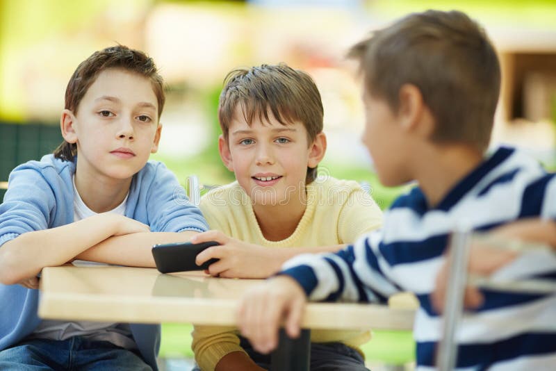 Communicating boys stock image. Image of leisure, contemporary - 57852029