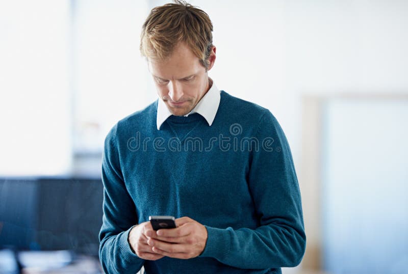 Communicating with Clients. a Young Businessman Sending a Text Message ...