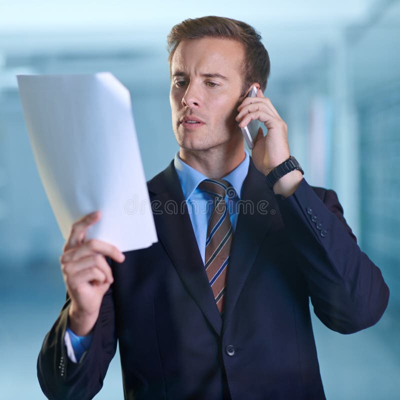 Communicating the Results To His Clients. a Young Businessman Reading a ...