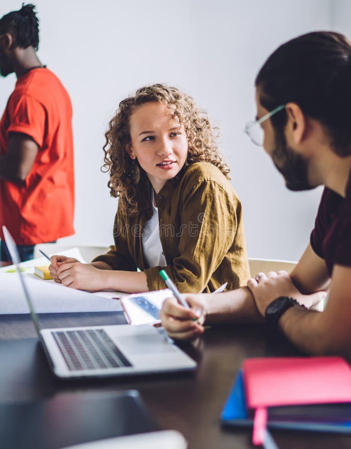 Communicating Young Students in Study Room Stock Photo - Image of ...
