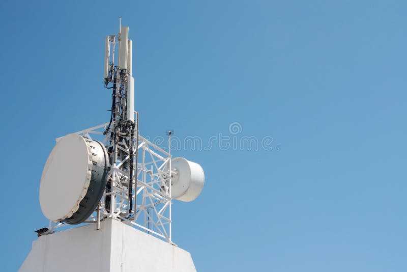 Communication Antenna Repeater Mounted on a Building Stock Photo ...