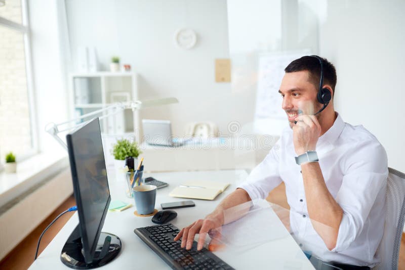 Businessman with Headset and Computer at Office Stock Image - Image of ...
