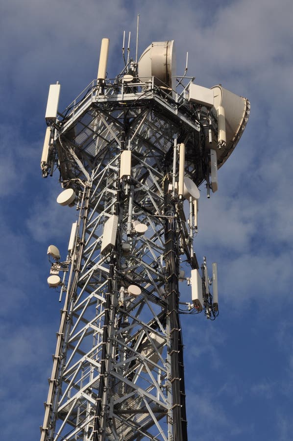Communication Cell Phone Tower on Blue Sky Background Stock Photo ...