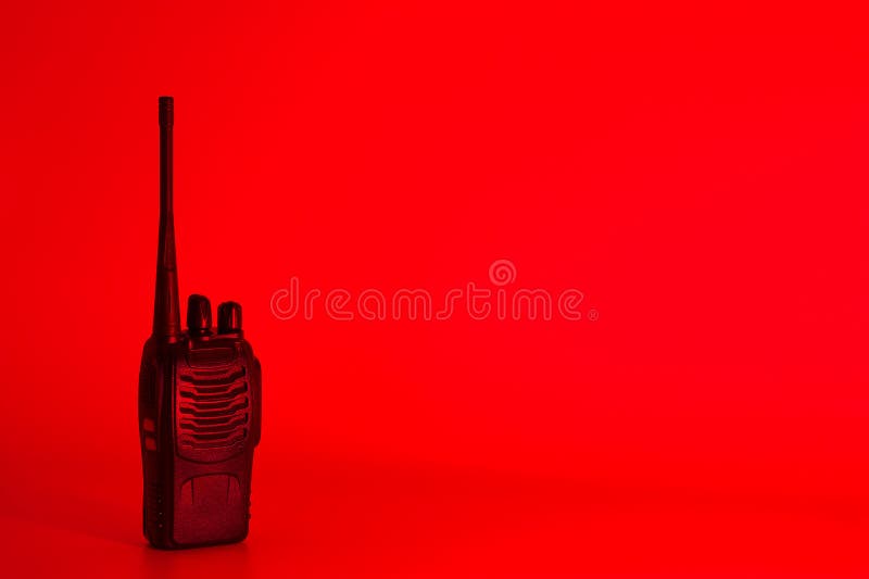 Communication Device with Red Background Showcasing Modern Technology ...