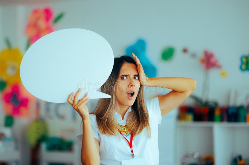 Educator Holding a Speech Bubble Making Surprised Expression Stock ...