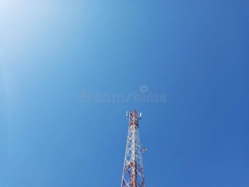 The Communication Signal Tower Rises High into the Sky during the Hot ...