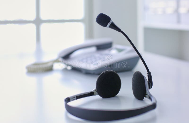 Call Center and Customer Service Help Desk. VOIP Headset on Laptop ...