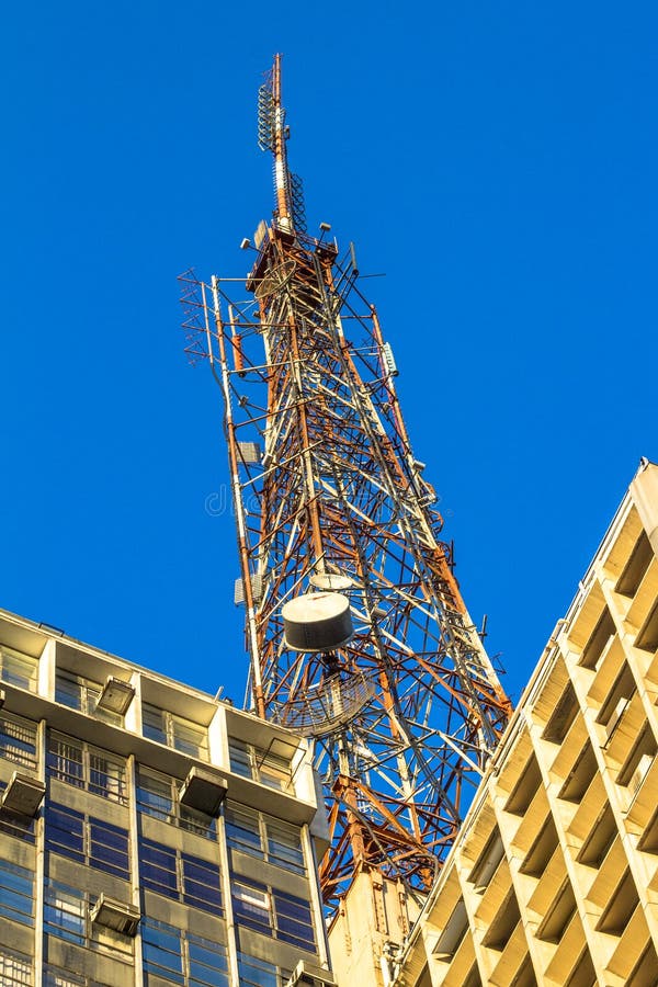 Telecommunication Tower with Copy Space in Roof Top of Building.Digital ...