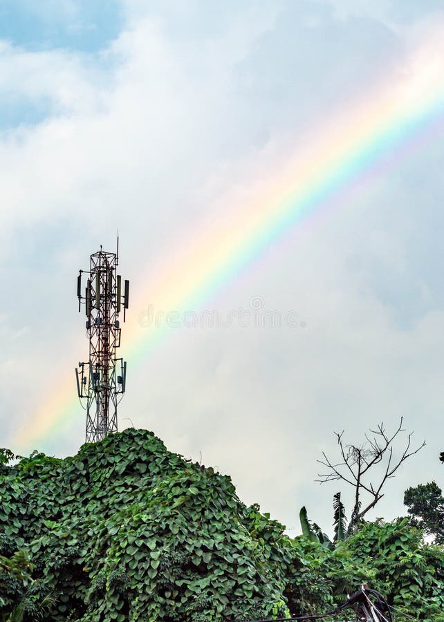 Communication Tower and Rainbow Stock Photo - Image of cloud ...