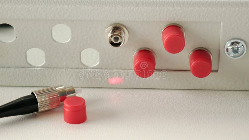 An Engineer Connects Magistral Optical Fiber Wires. a Man Commutes ...