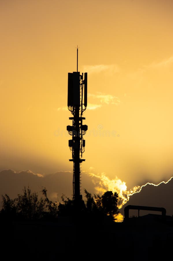 Communications Mast in Silhouette at Sunset Stock Image - Image of ...
