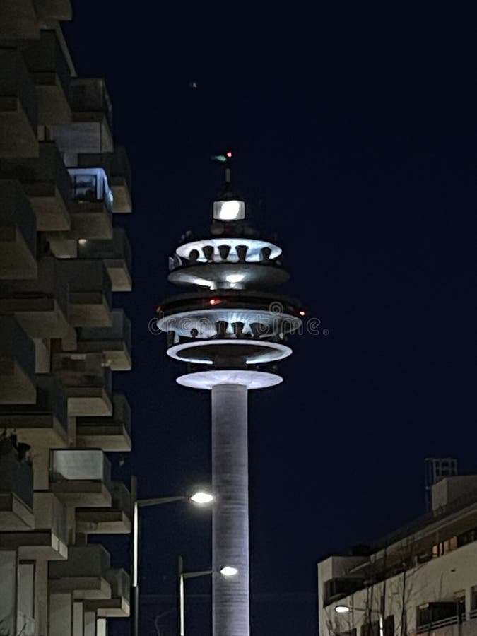 Communications Tower Lit Up in the Night Stock Image - Image of glow ...