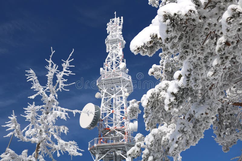 Communications Tower in Winter Landscape Stock Photo - Image of ...