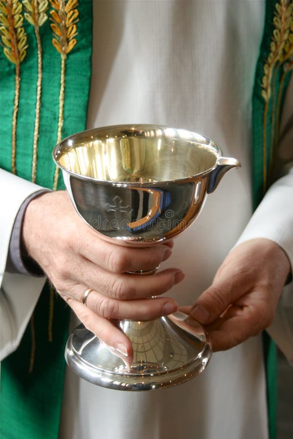 Catholic Priest with Chalice and Host at Communion Stock Image - Image ...