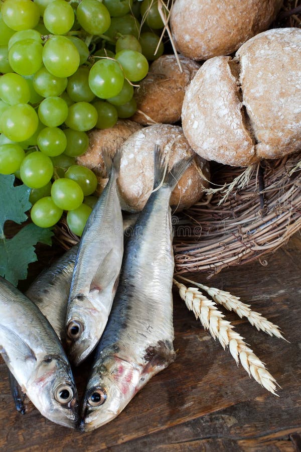 Communion Bread with Fish and Grapes Stock Image - Image of still ...