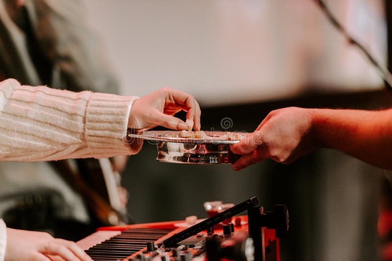 Communion with Bread and Wine during the Service in the Assembly Stock ...