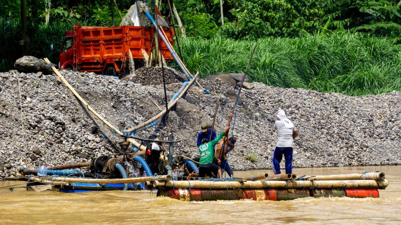 The Community Mines Sand in the River during the Day Together Editorial ...